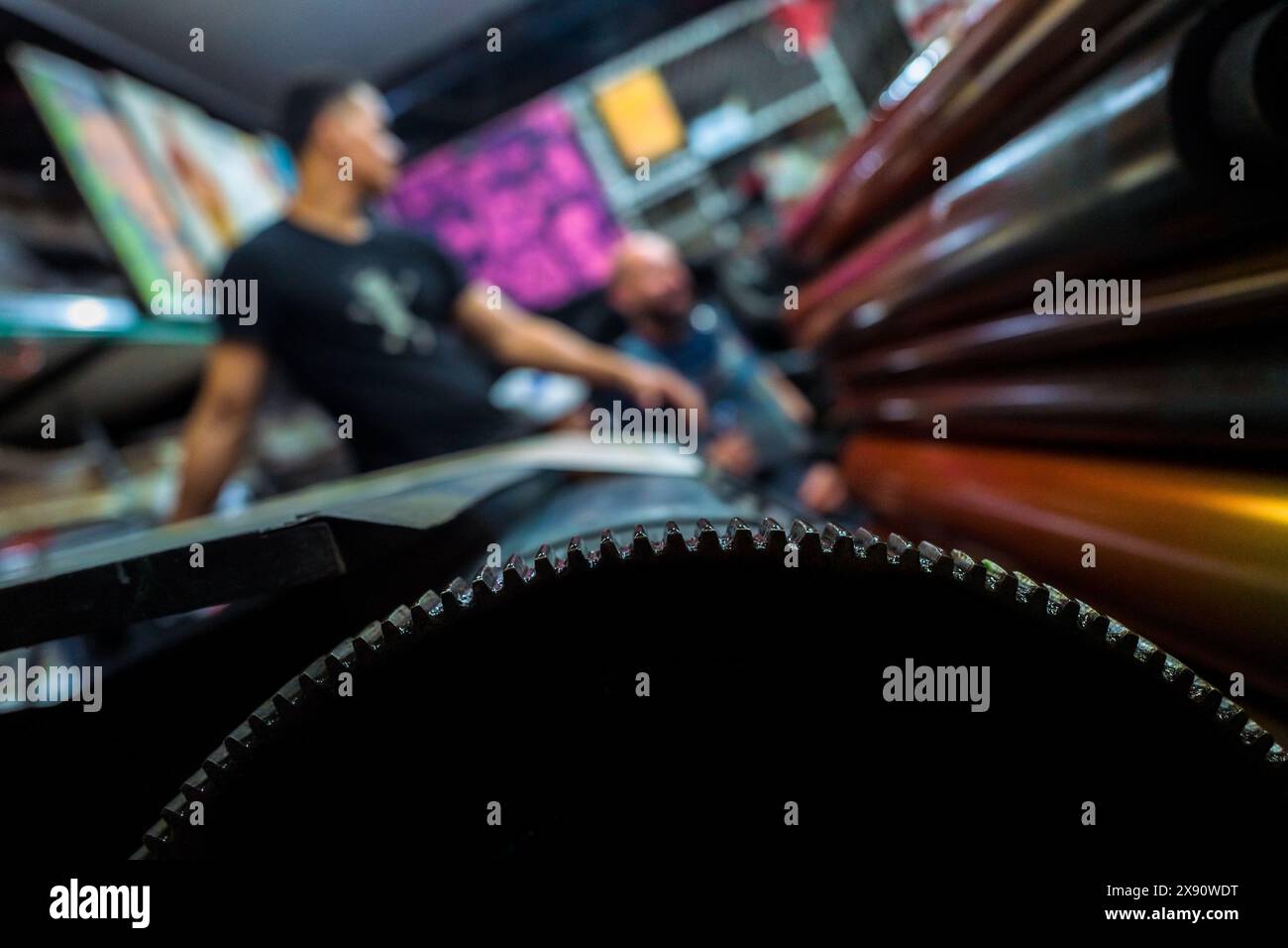 A detail view of the gear cog of the historical letterpress machine at ...