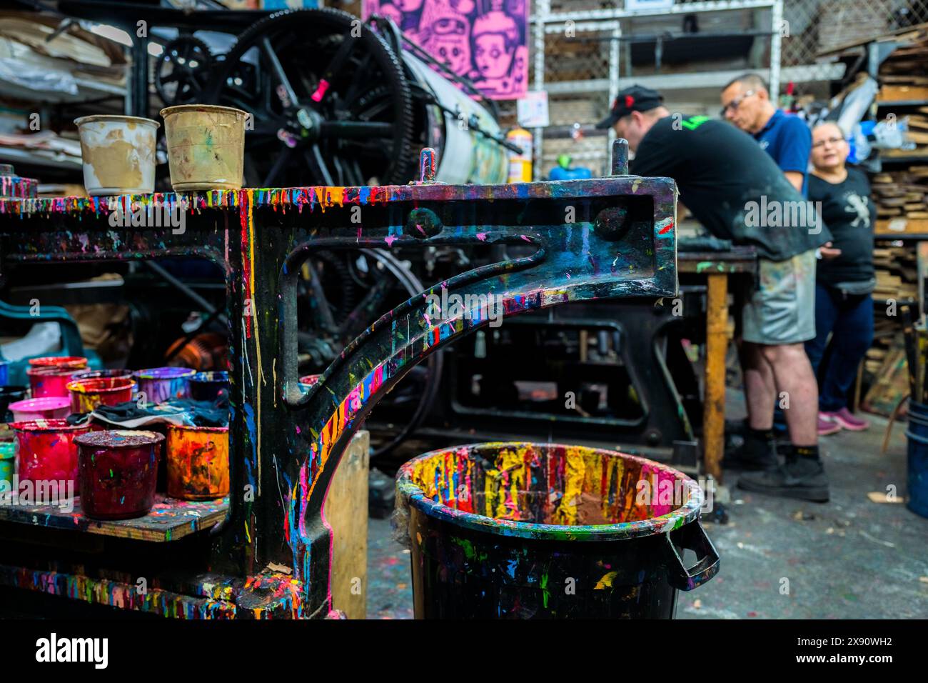 A cast iron frame of the historical letterpress machine is seen ...