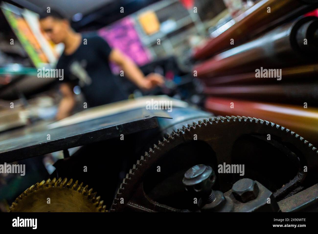 A detail view of the gear cogs of the historical letterpress machine at ...