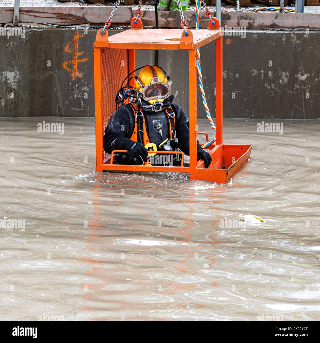 Henstedt Ulzburg, Germany. 28th May, 2024. A construction diver is ...