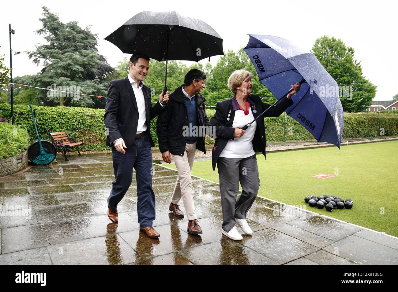 Prime Minister Rishi Sunak with local candidate Luke Evans (left) and ...