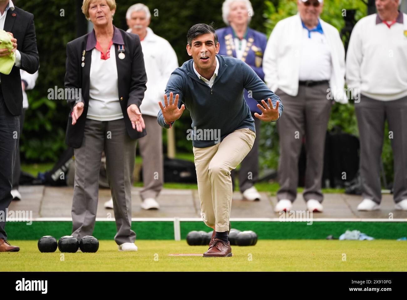 Prime Minister Rishi Sunak plays a game of bowls during a visit to ...