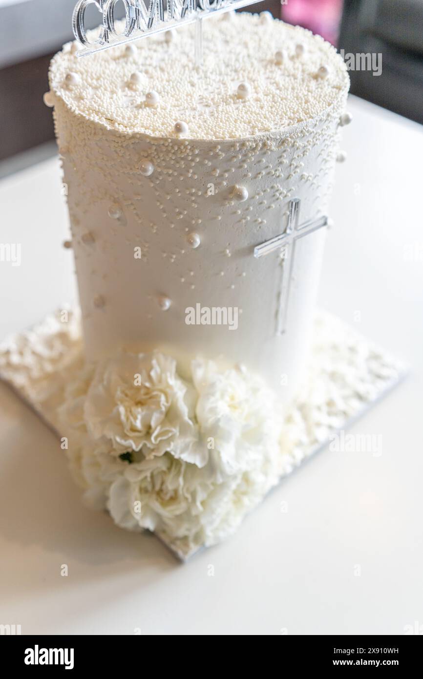 1st holy communion cake with decorations- close up view Stock Photo - Alamy