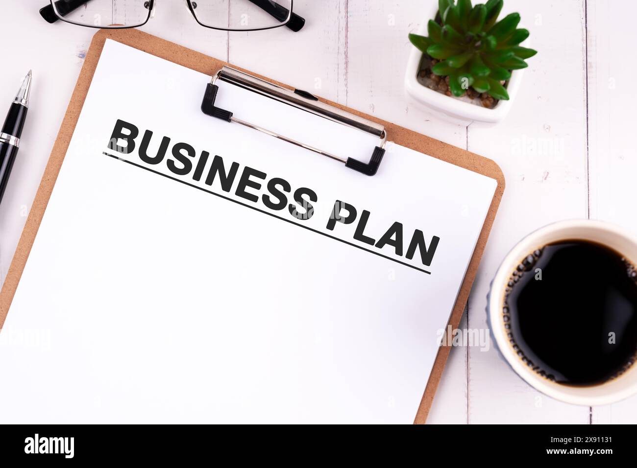 Business plan text on clipboard business concept Stock Photo - Alamy