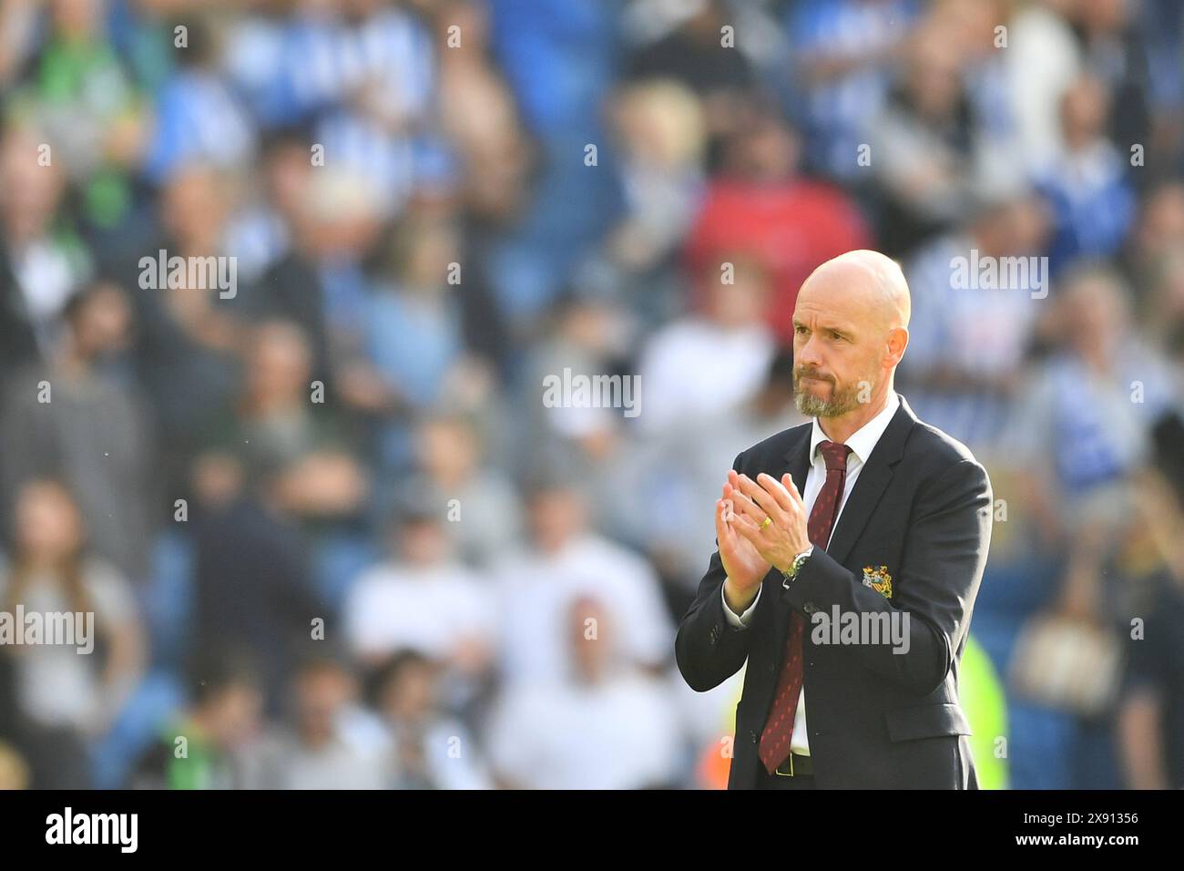 Manager of Manchester United Erik ten Hagapplauds the fans - Brighton ...