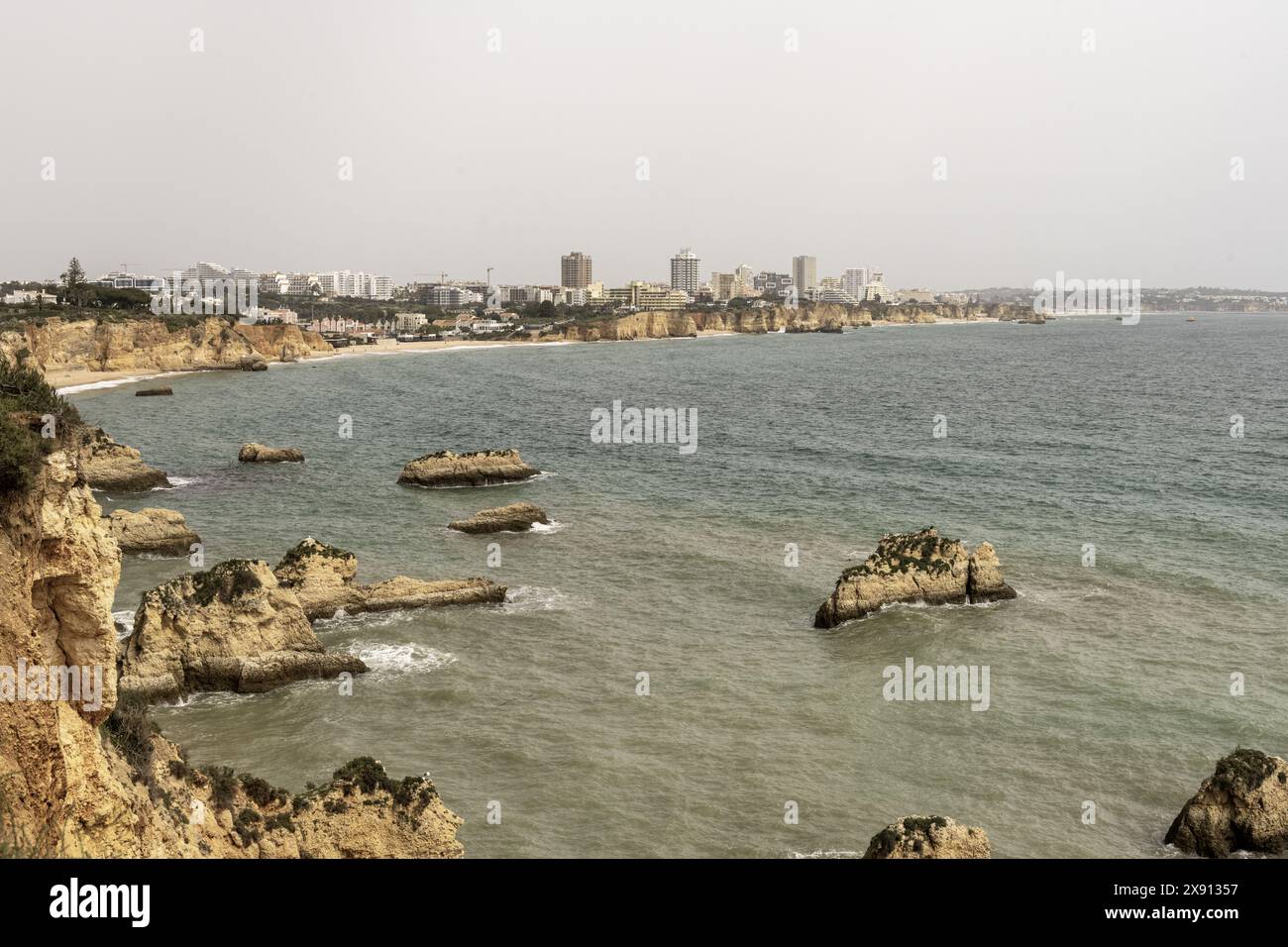 Stunning view of coastal rock formations and sea arches in Portimao ...