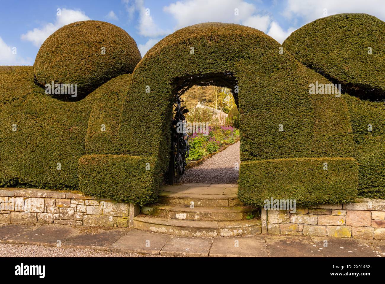 Topiary arch in the walled garden of Hutton-in-the-Forest, originally a ...