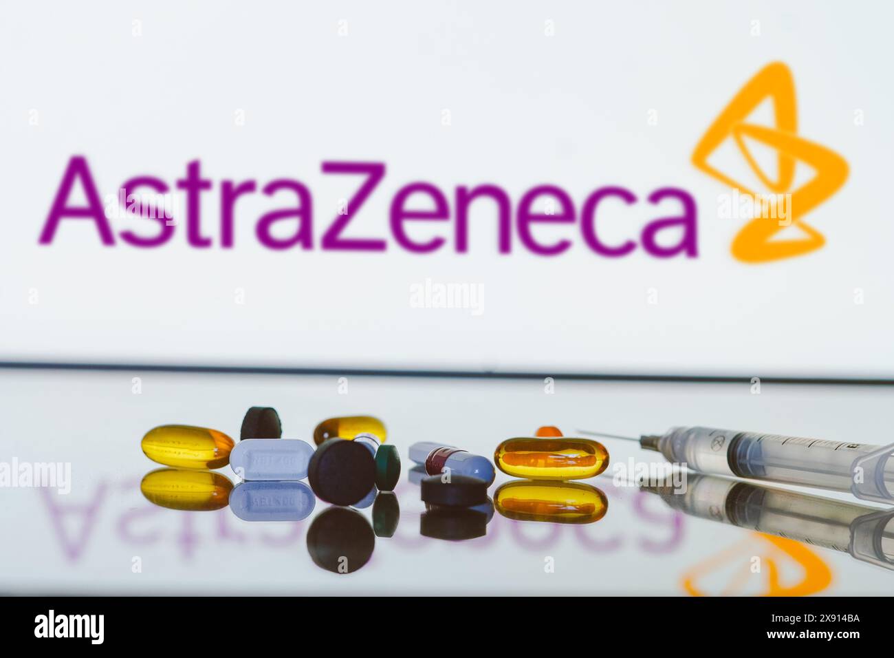 In this photo illustration, the AstraZeneca logo is displayed on screen ...