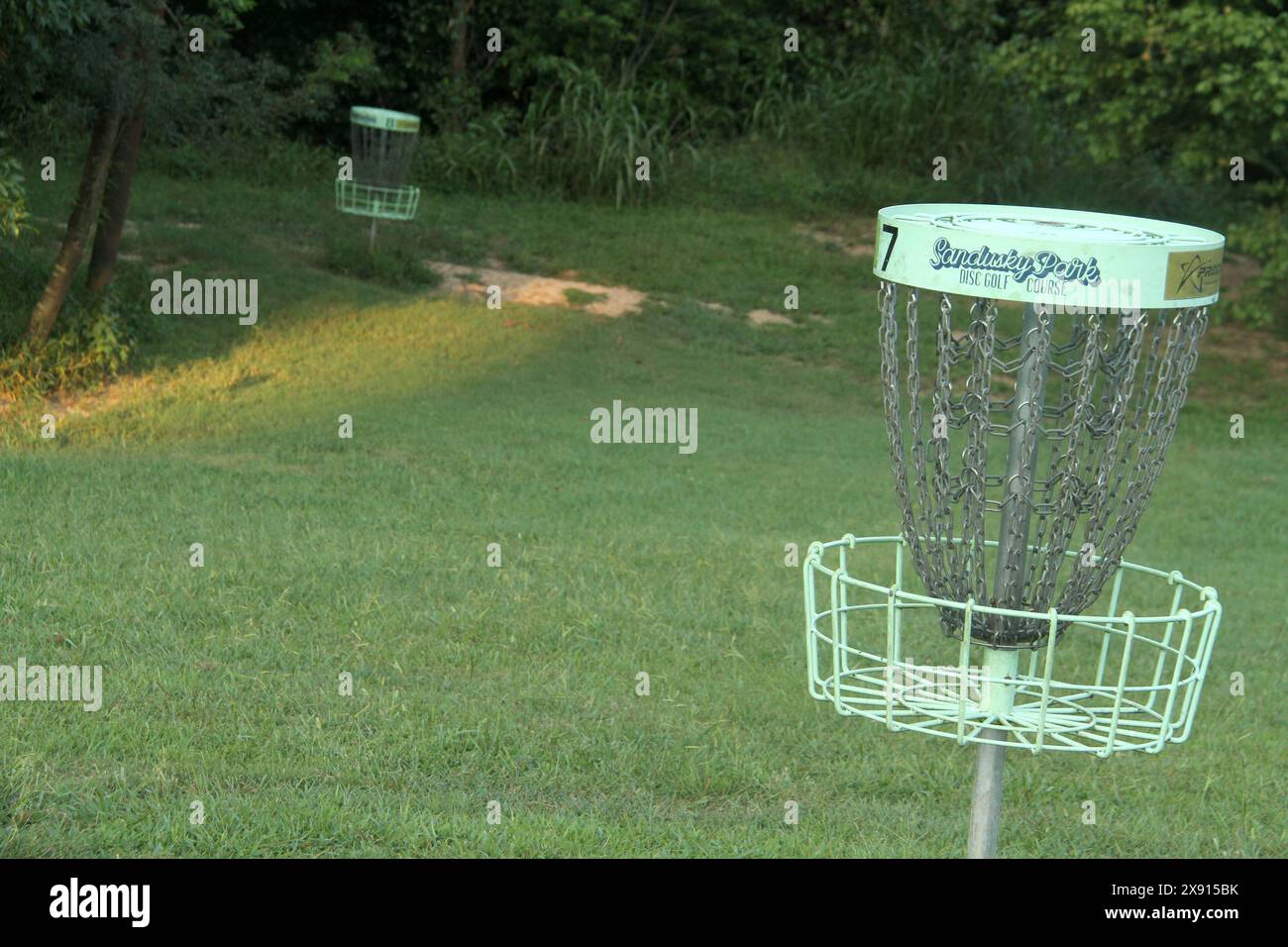 Disc (frisbee) golf baskets in a park in the U.S.A Stock Photo - Alamy
