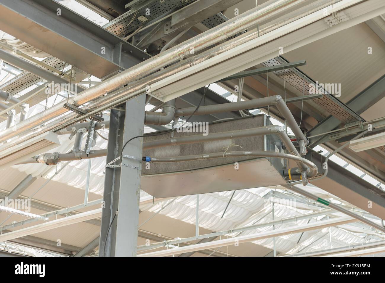 Industrial air conditioning handling unit suspended on frame ...