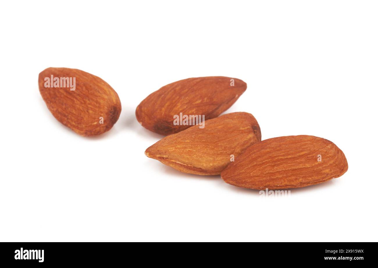 Almonds isolated on a white background Stock Photo - Alamy
