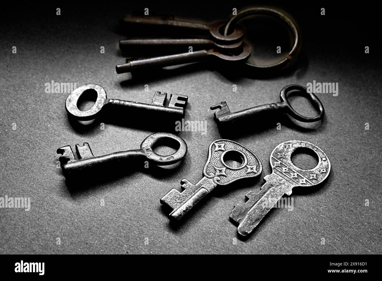 02 09 2019 Vintage Old Black and White Photo of Rusted keys on a gray ...