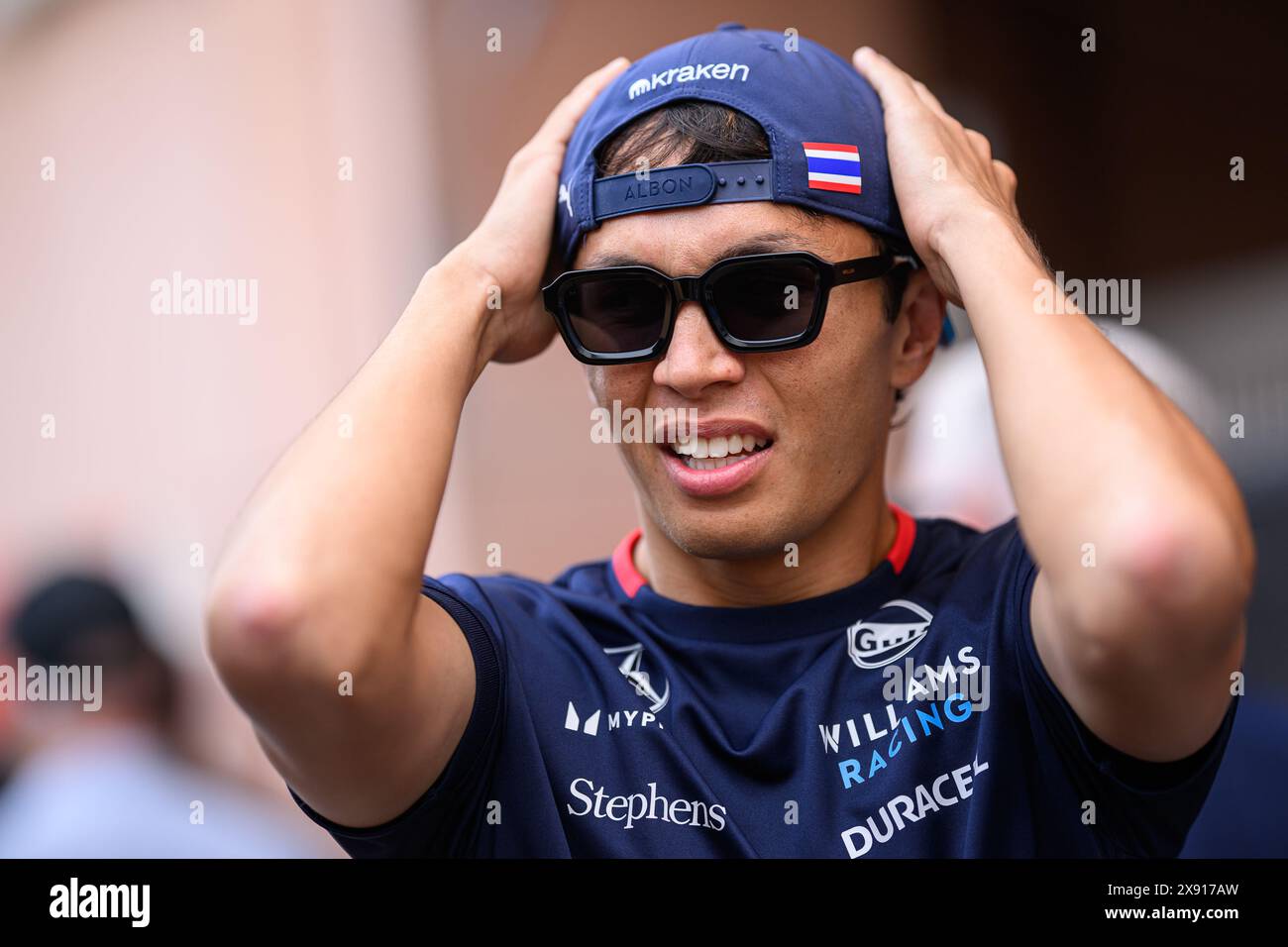 Williams Racing’s Thai driver Alexander Albon reacts in the paddock ...