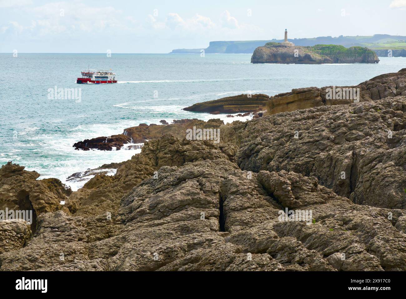 Los Reginas Ferries Doblemar Dos tourist boat off the coast with Moors ...