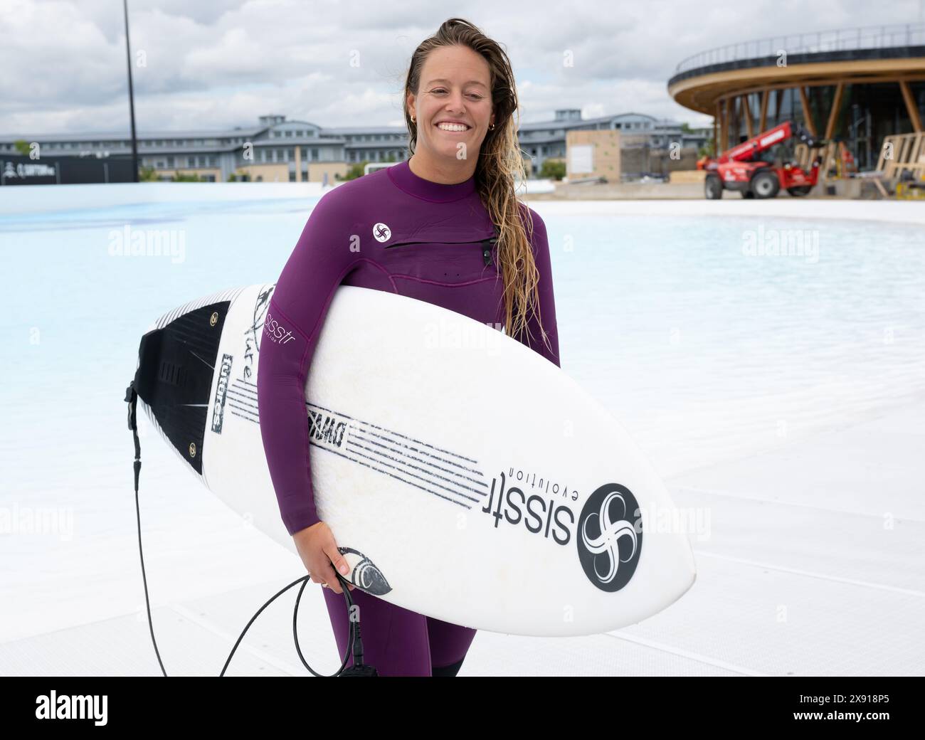 Hallbergmoos, Germany. 28th May, 2024. Camilla Kemp, surfer, stands ...