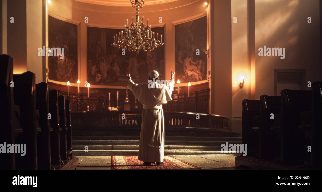 In Church Cathedral Pope Stands at Altar, and Raises his Hands Towards ...
