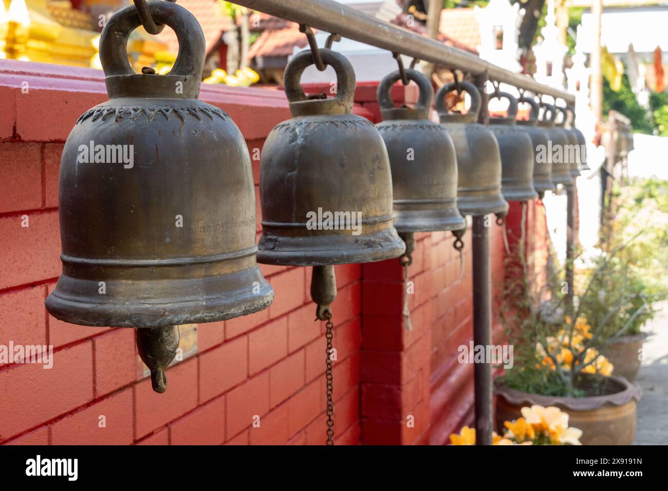 Thai Buddhist Temple wat prayer bells in a row in Chiang Mai Thailand ...