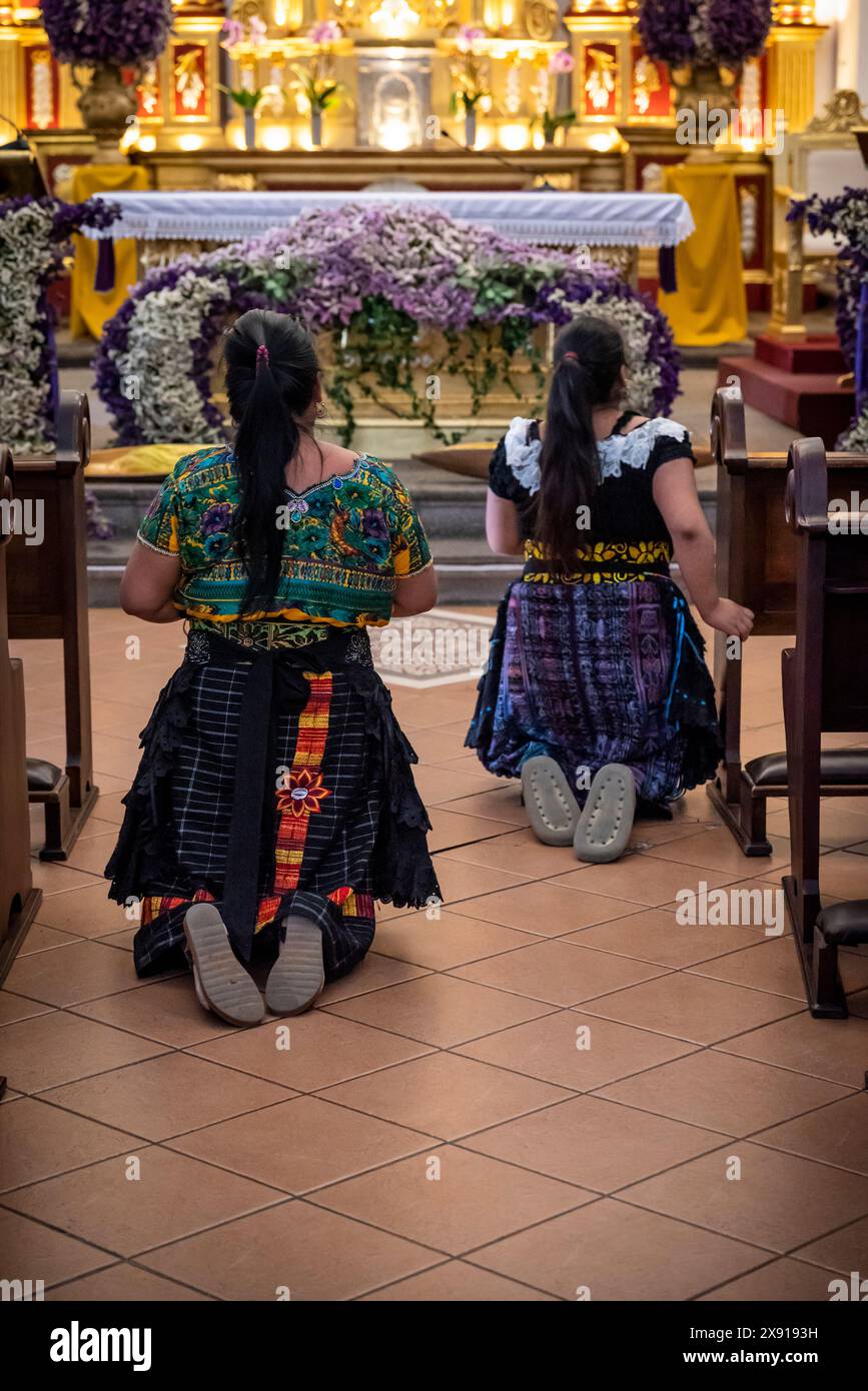 Mayan women walking on their knees to the altar, San José Cathedral ...