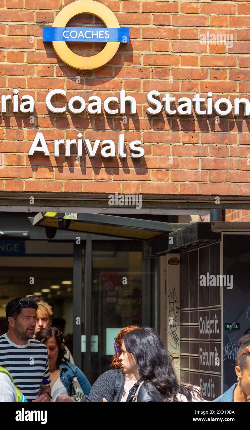 People arrive at Victoria Coach Station in London as rail passengers ...