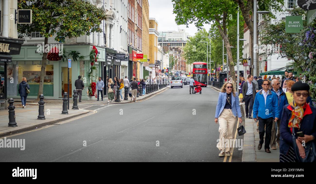 LONDON- MAY 23, 2024: Kings Road Chelsea shopping street scene ...
