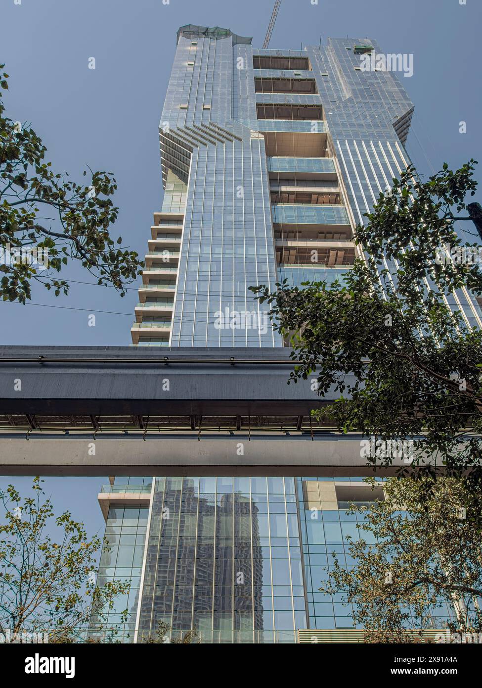 02 25 2024 Tall multi-storied buildings behind the 30 feet high ...