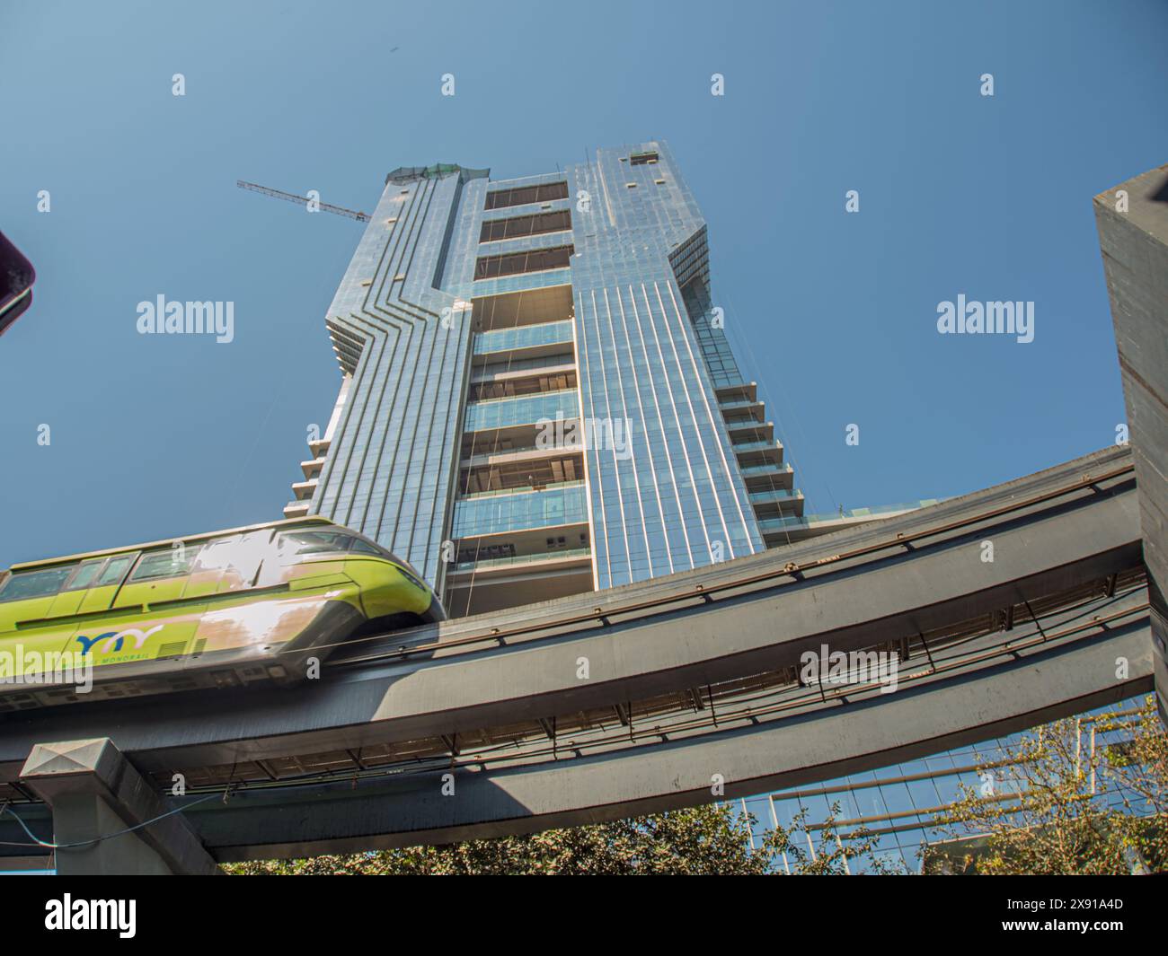 02 25 2024 Tall multi-storied buildings behind the 30 feet high ...