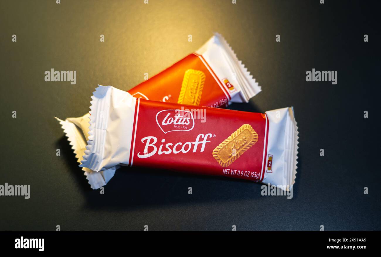 Two packets of Lotus Biscoff cookies on black matte background Stock ...