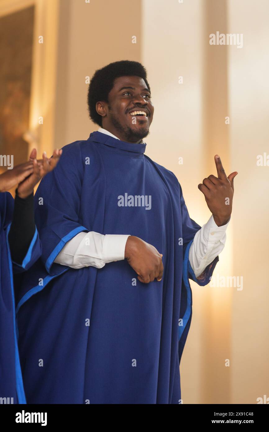Portrait of Cheerful African American Man in Blue Robe in Sunday Church ...