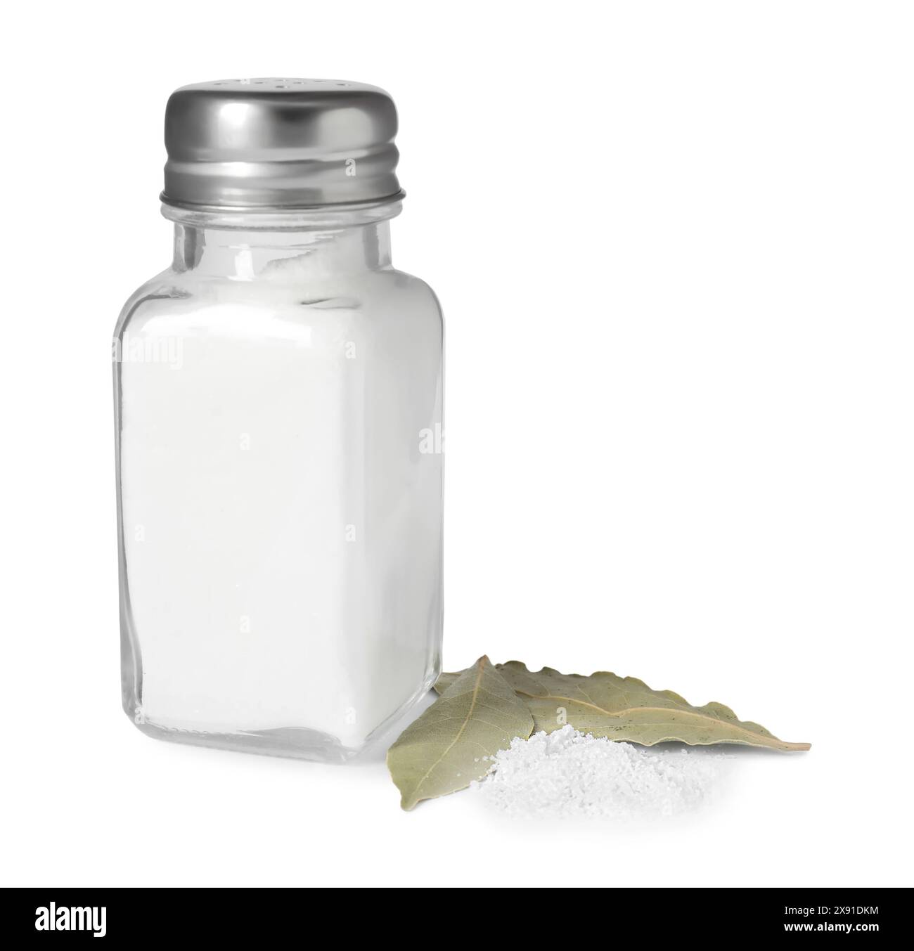 Salt shaker and bay leaves isolated on white Stock Photo - Alamy