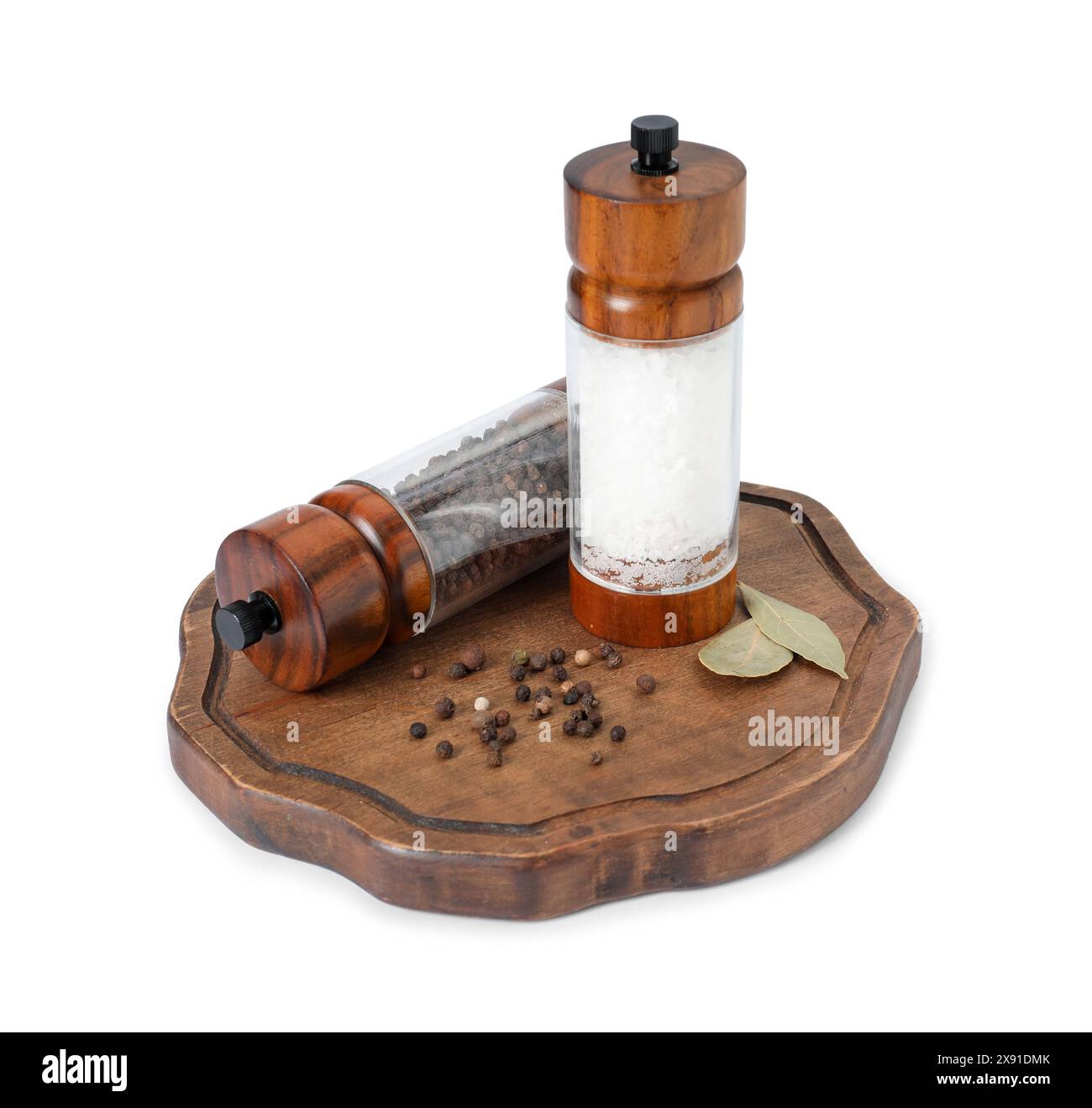 Salt and pepper shakers with bay leaves isolated on white Stock Photo ...