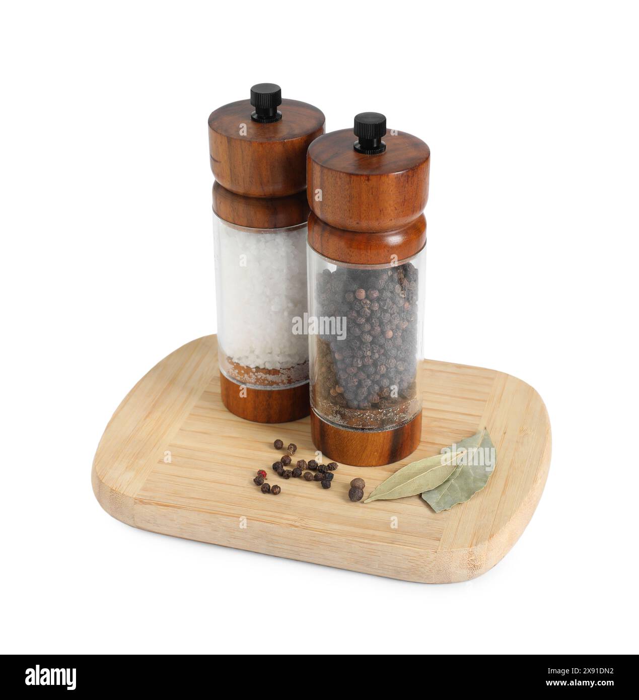 Salt and pepper shakers with bay leaves isolated on white Stock Photo ...