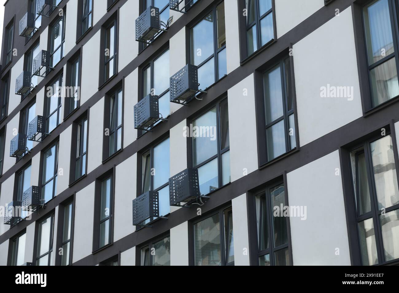 Exterior of modern building with big windows Stock Photo - Alamy