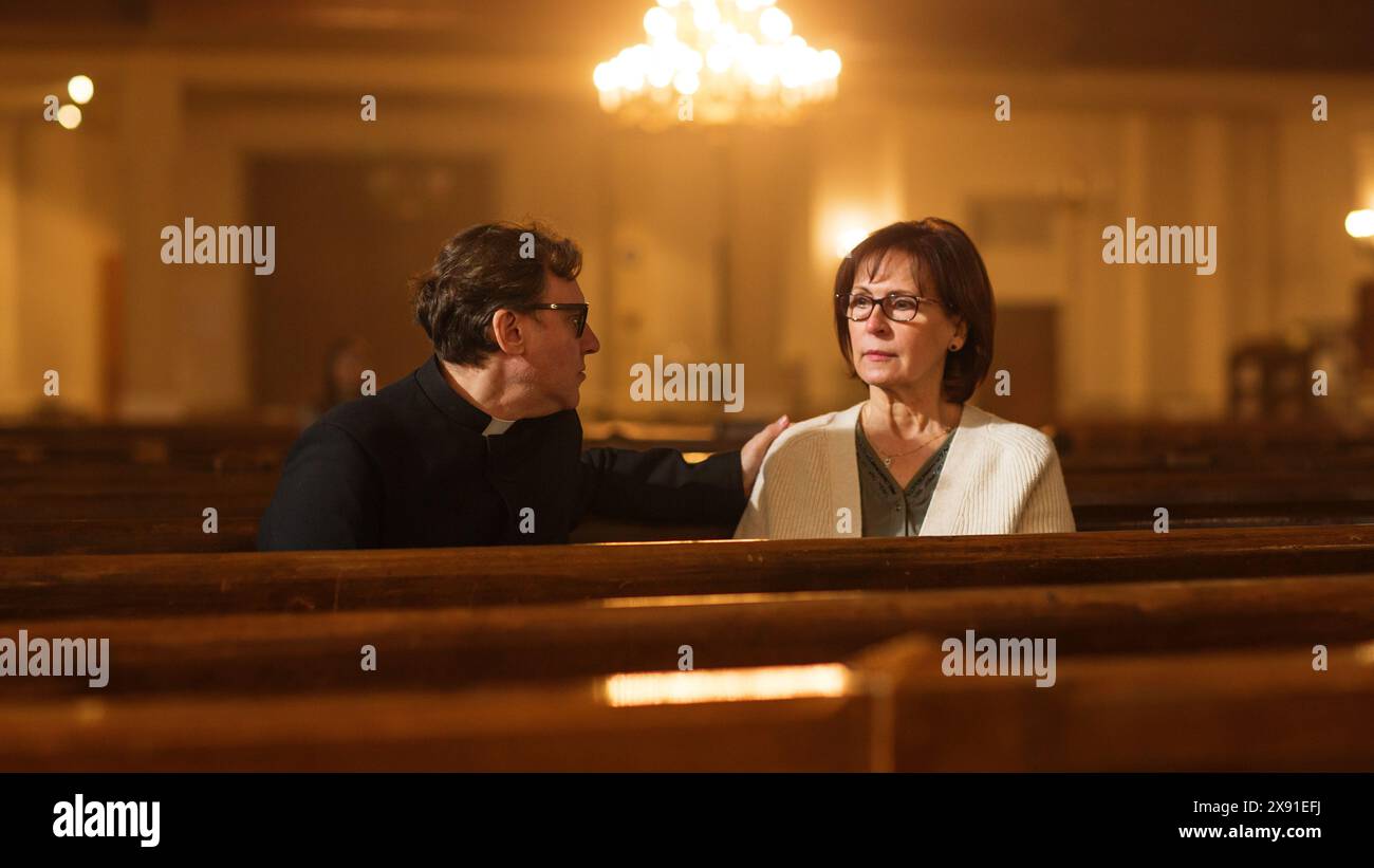 Portrait of Pastor Comforting an Emotional Senior Female Going through ...