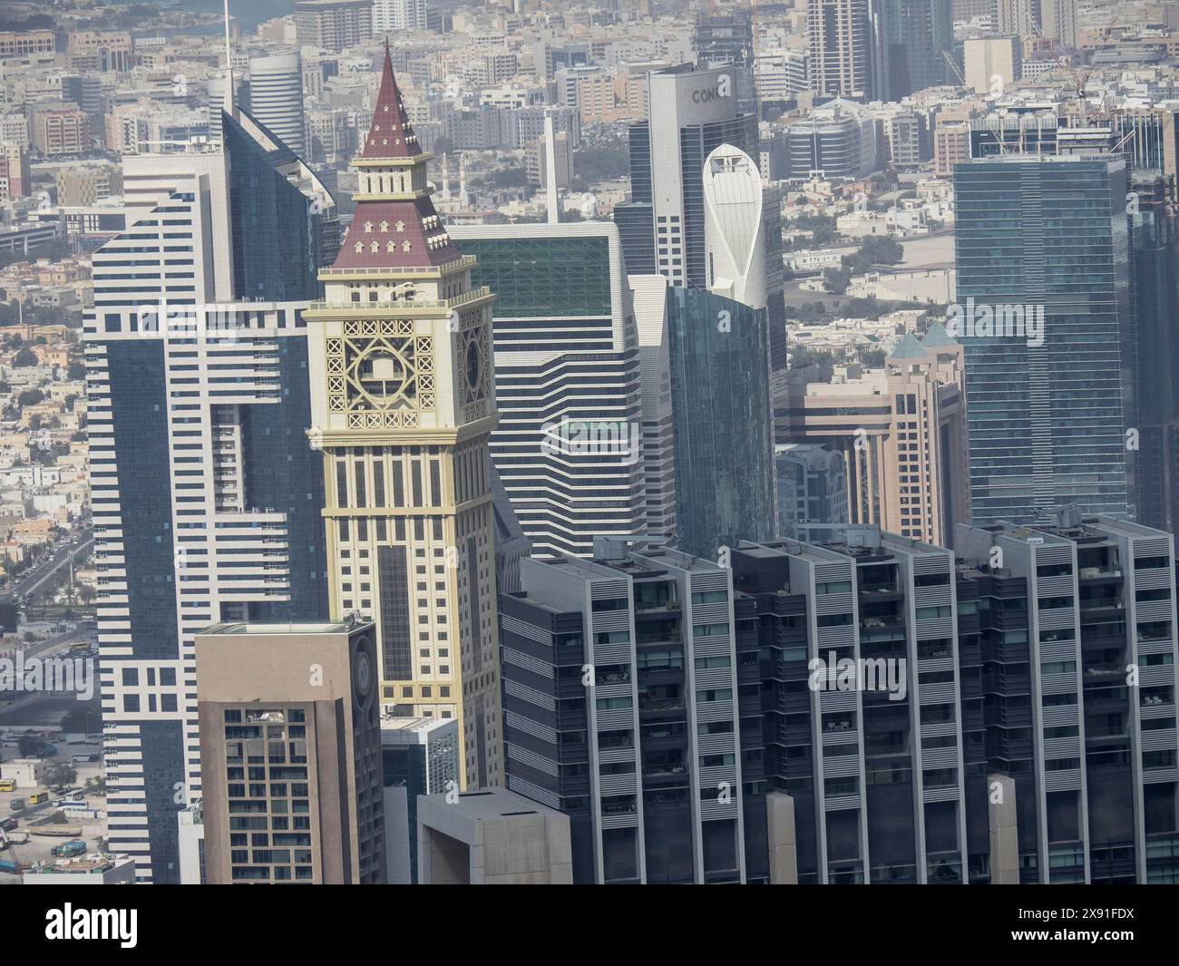 City centre with a striking building with a clock tower and modern ...