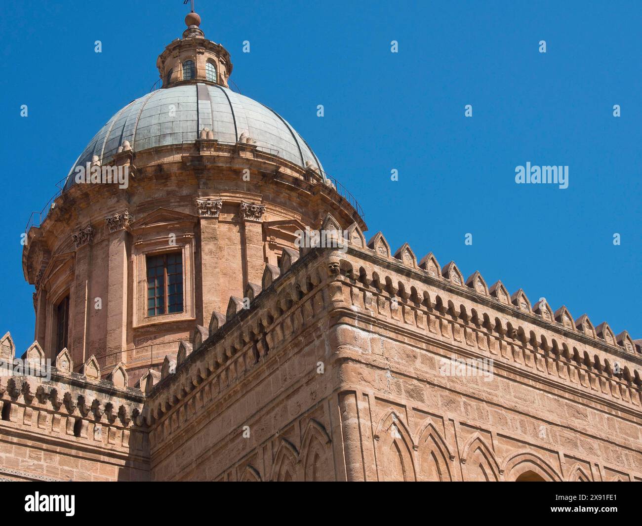 Large dome of the gothic cathedral under a clear blue sky, historic ...