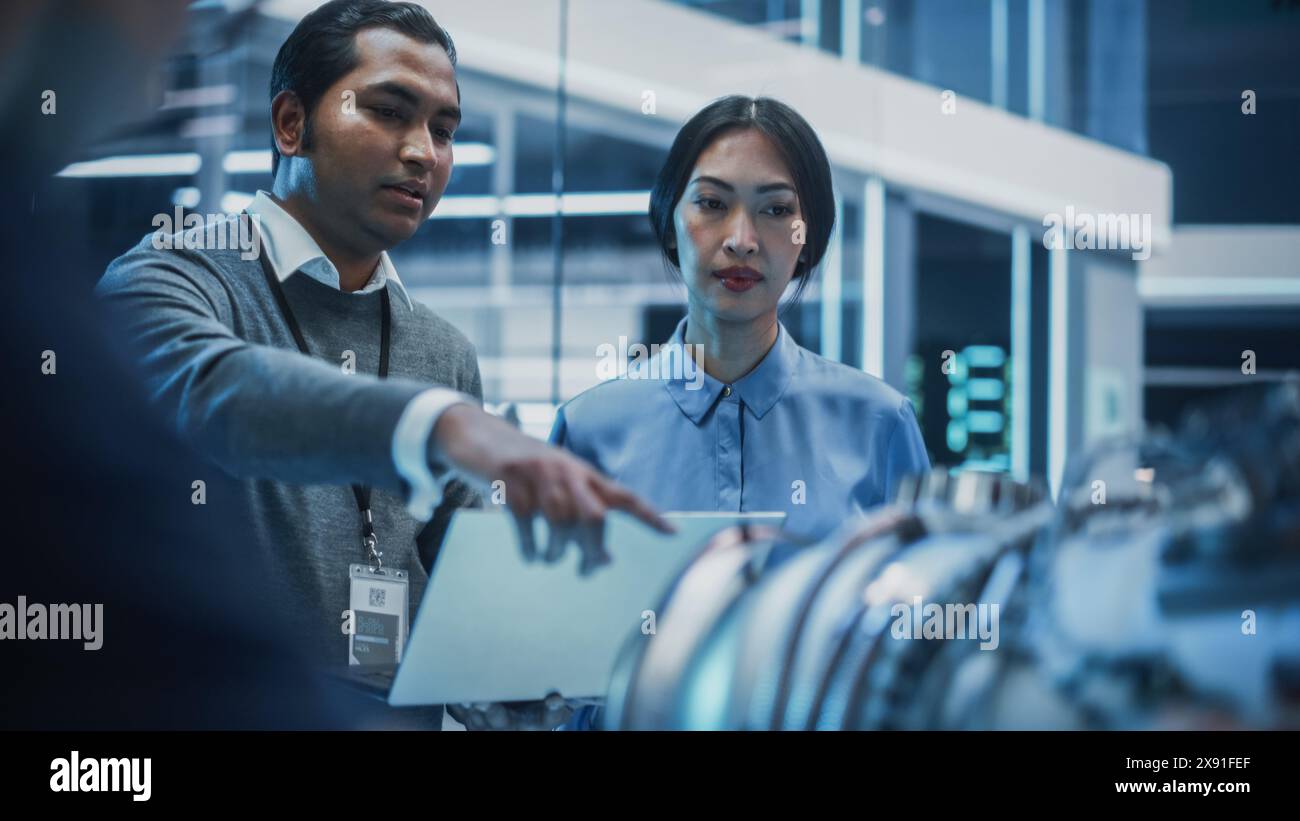 Two Multiethnic Employees Work in Modern Innovative Research Facility ...