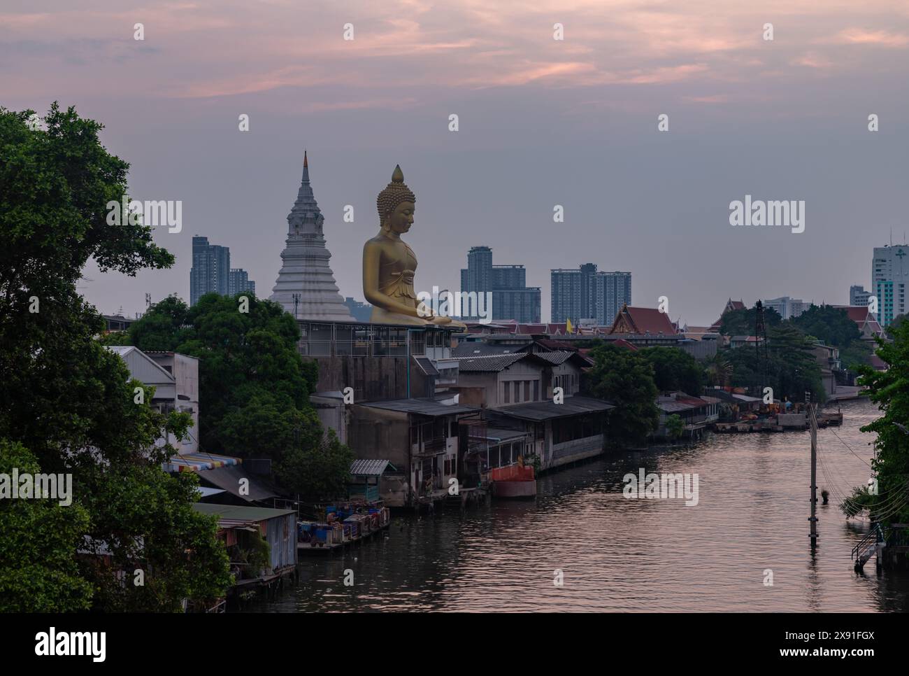 A picture of the large Buddha statue at the Wat Paknam Bhasicharoen ...