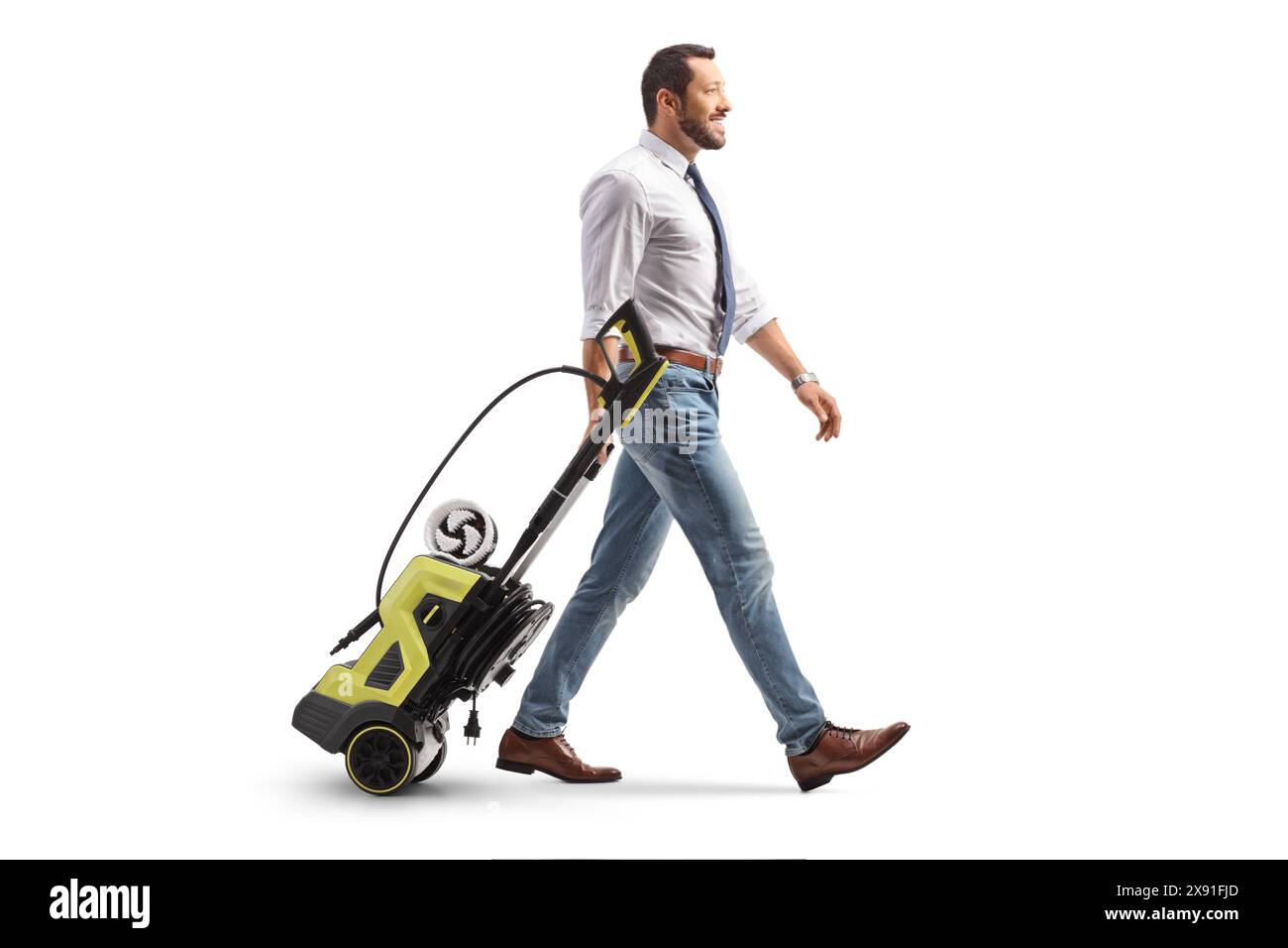 Man walking and pulling a high pressure washer machine isolated on ...