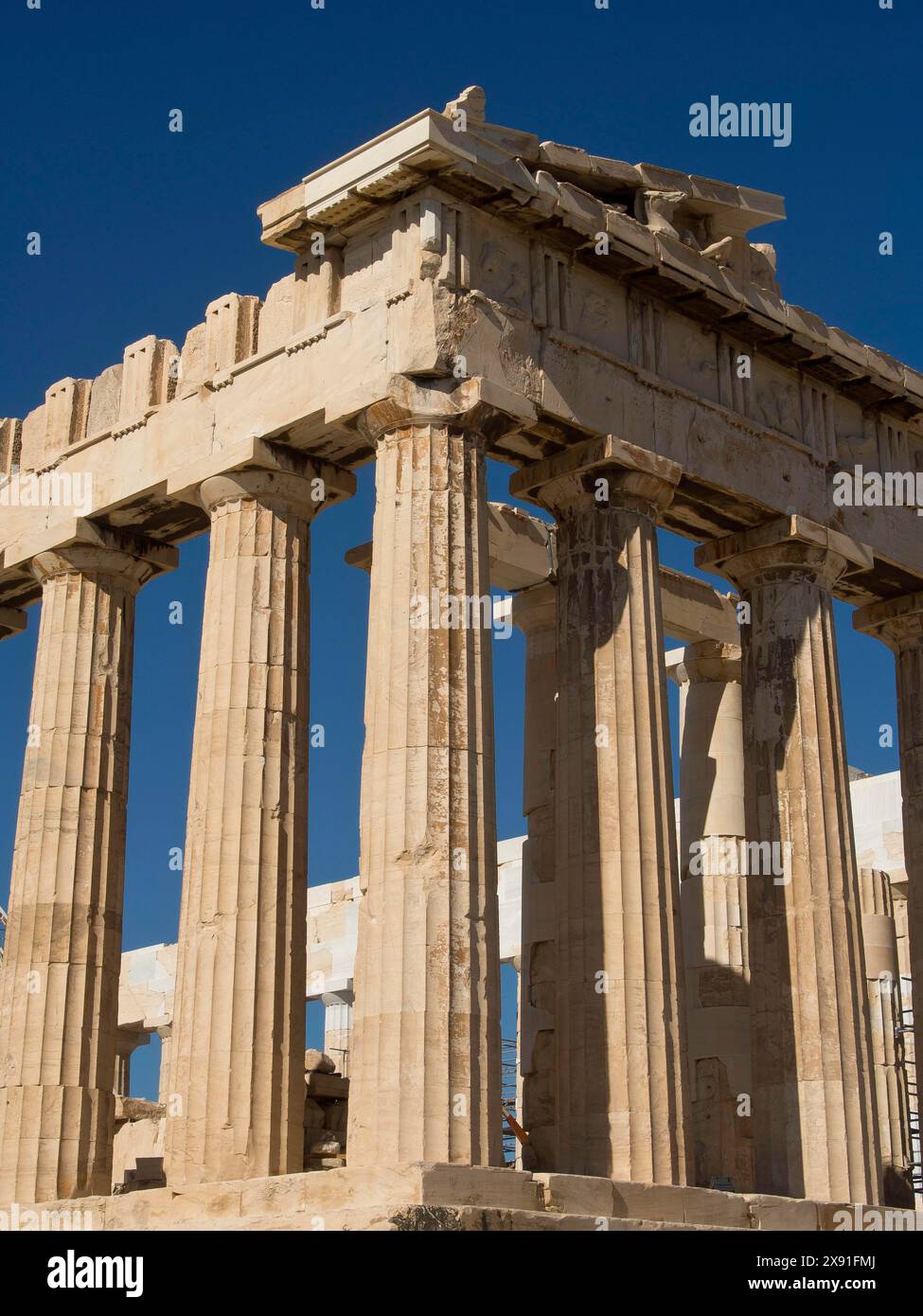 Detail of an ancient temple with doric columns, ancient columns in ...