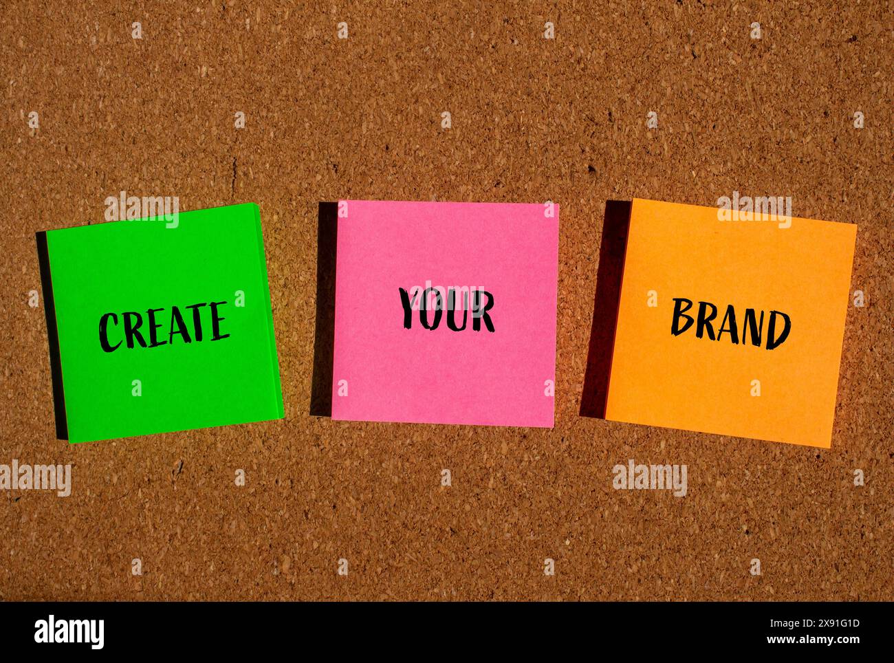 Create your brand words written on colorful papers with brown ...