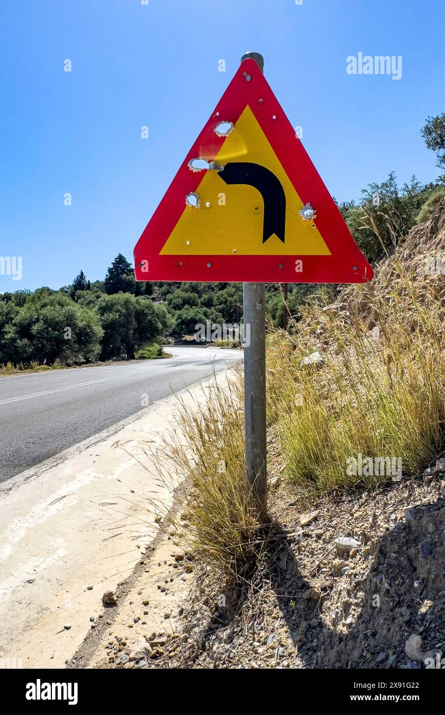 Bullet holes in road sign is target for target practice of bullets shot ...