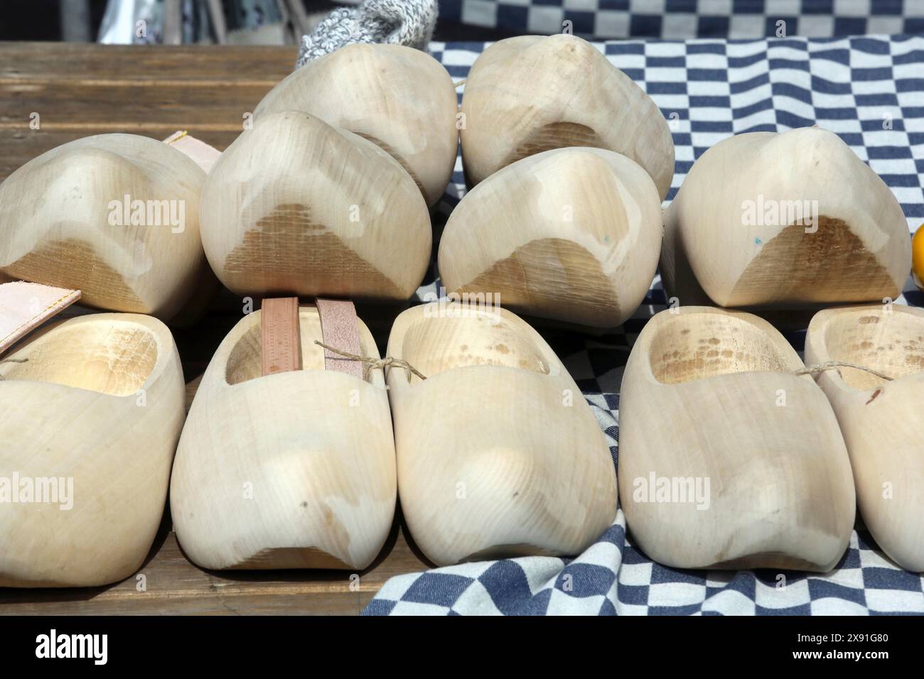 Dutch wooden clogs on display at a street market in Holland. Alkmaar ...