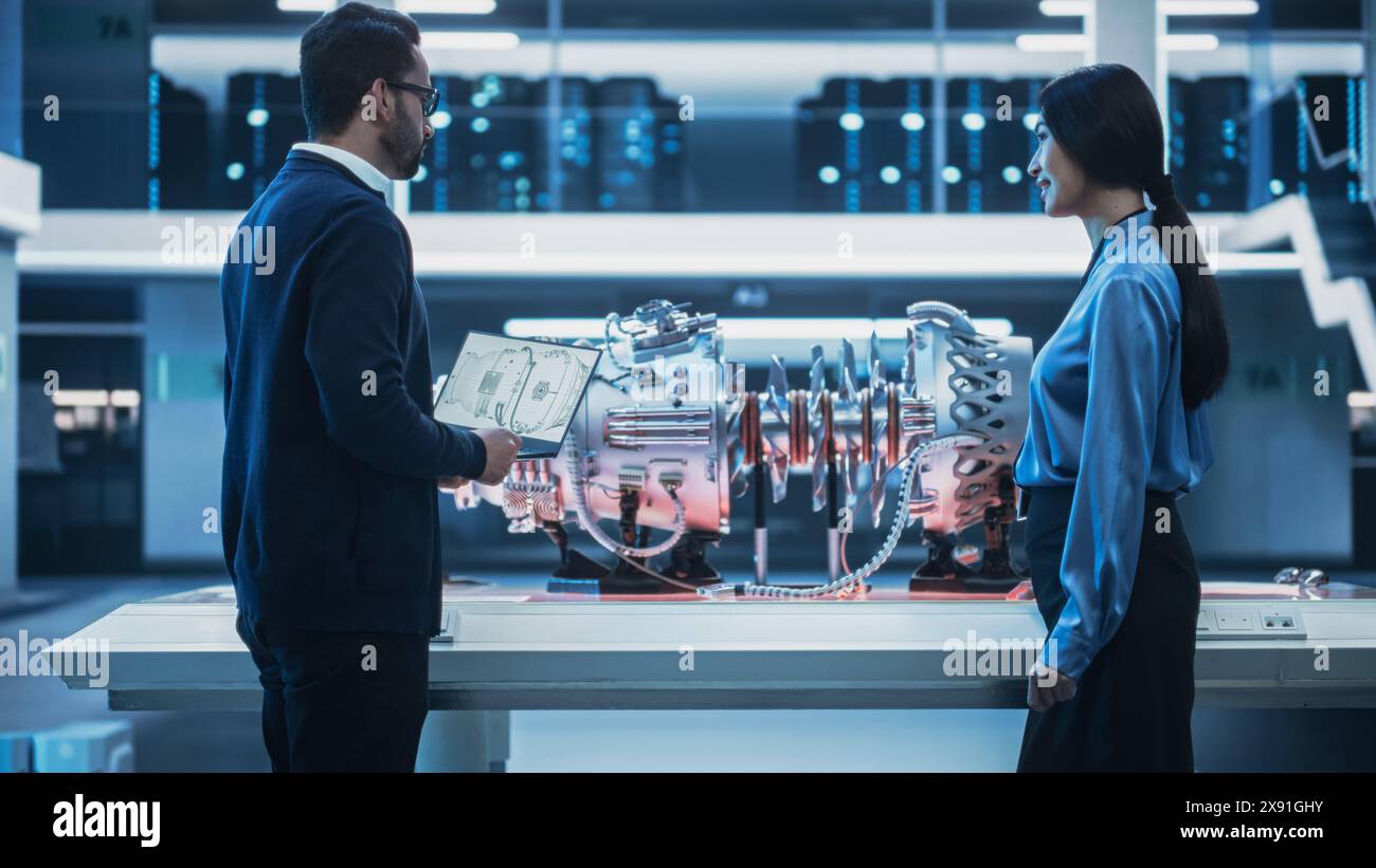 Two Multiethnic Employees Standing in a Modern High Tech Research ...