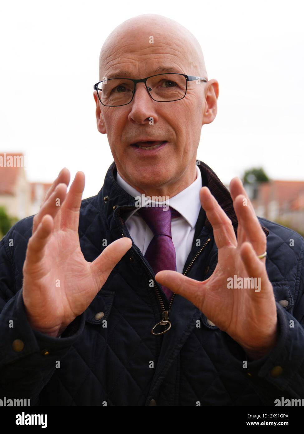 SNP Leader John Swinney doing media interviews as he goes canvassing ...