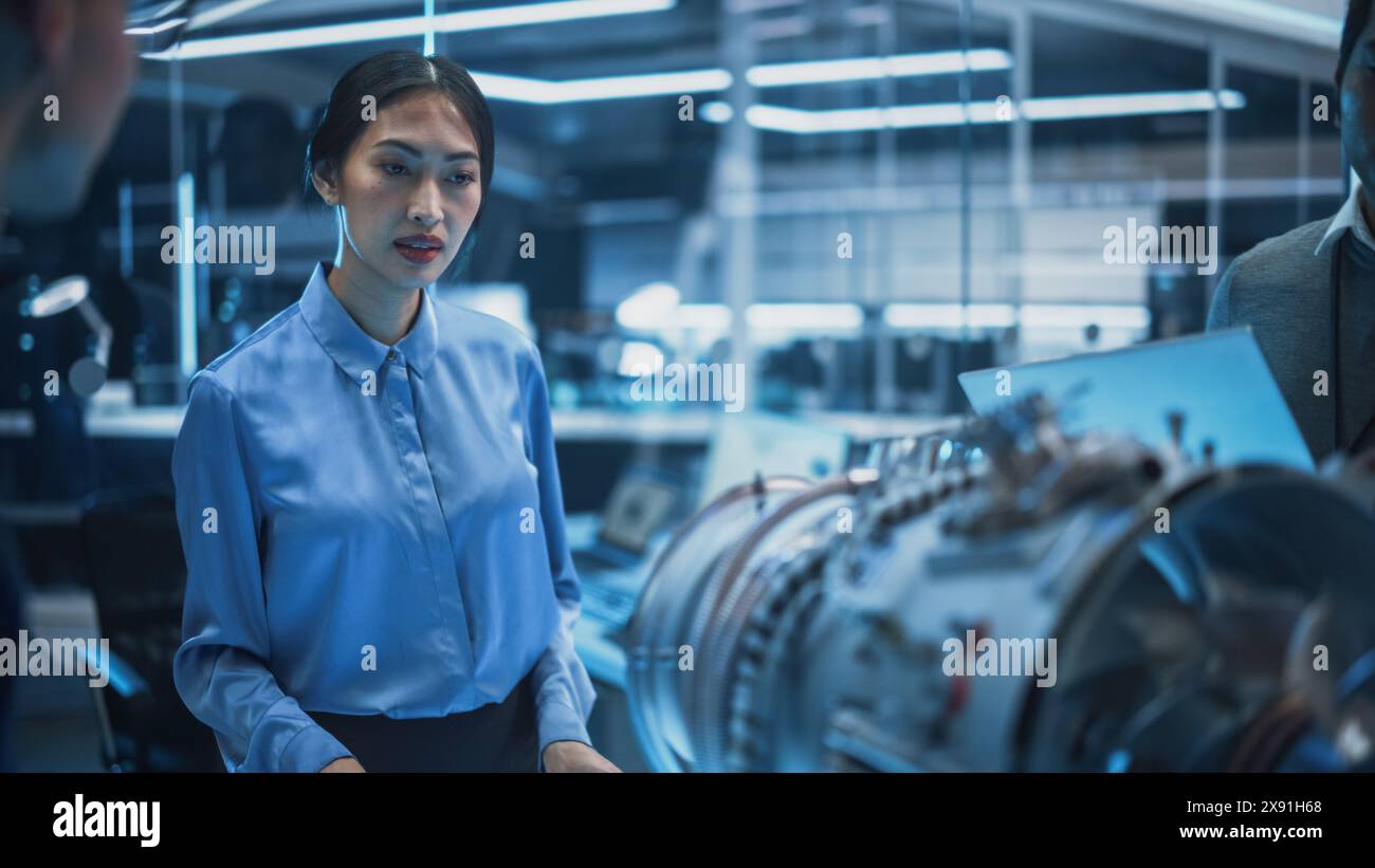 Young Diverse Multiethnic Asian Female Engineer Analyze How a Modern ...