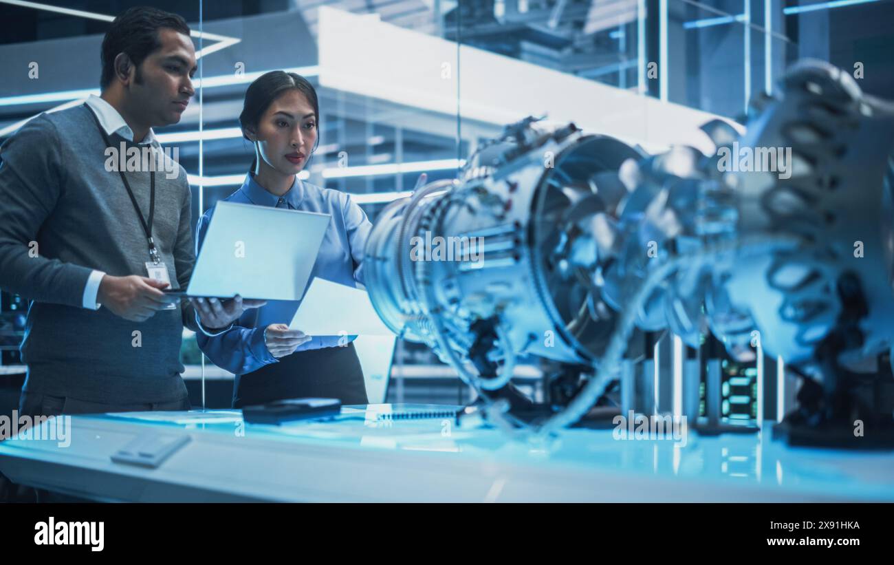 Young Team of Diverse Multicultural Engineers Have a Meeting, Analyze ...