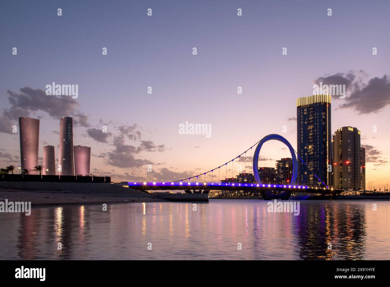 Plaza Tower Lusail Boulevard with Arch Bridge sunset time Stock Photo ...
