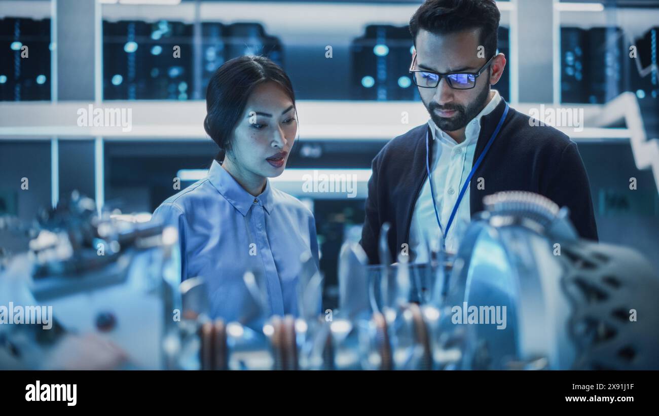 Two Multiethnic Employees Work in Modern Innovative Research Facility ...