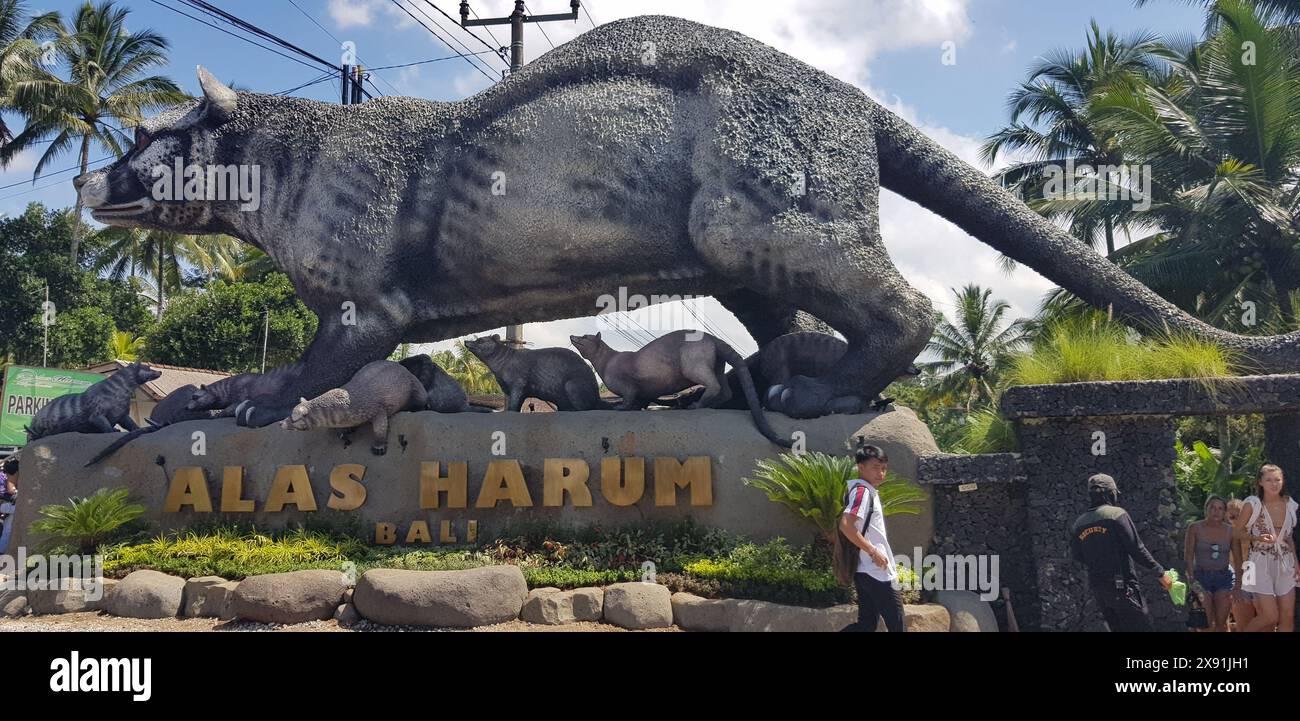 Alas Harum entrance sign in Ubud Bali. A 'Luwak' statue aka Asian Palm ...