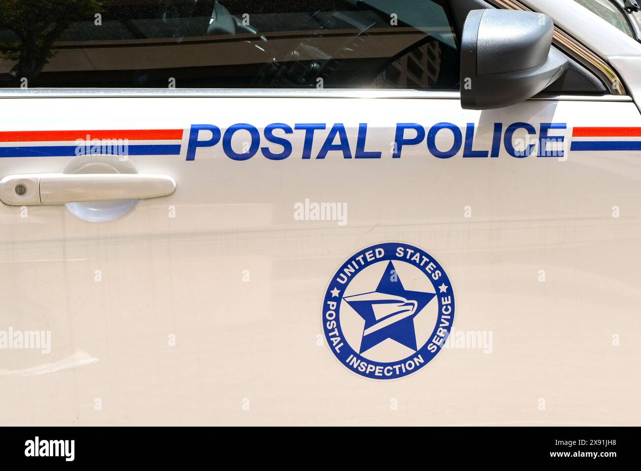 Washington DC, USA - 30 April 2024: Badge on the side of a patrol car ...